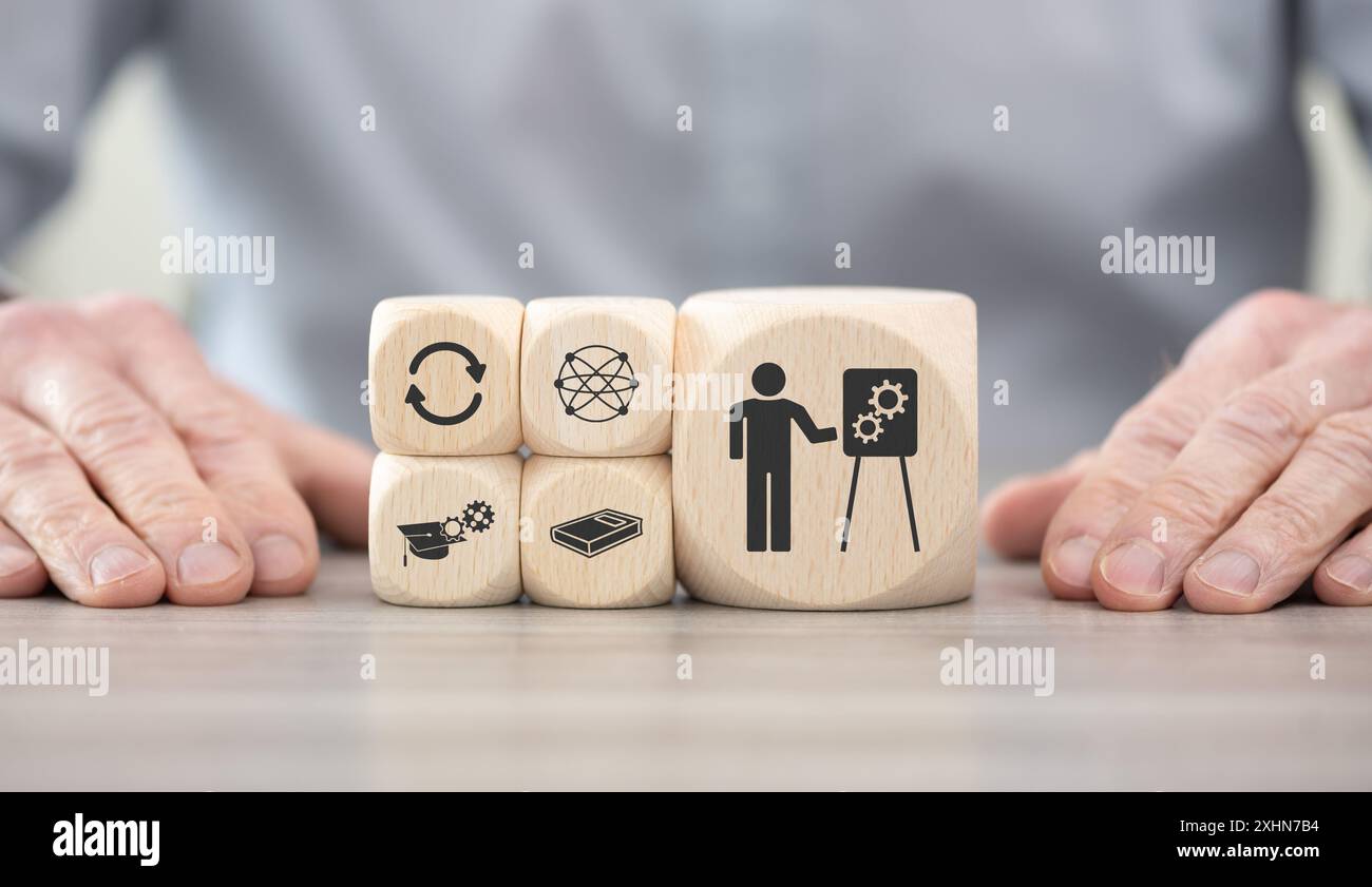 Wooden blocks with symbol of training concept Stock Photo - Alamy