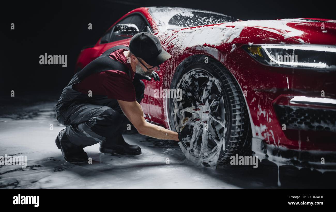 Red sportscar in car wash hi-res stock photography and images - Alamy