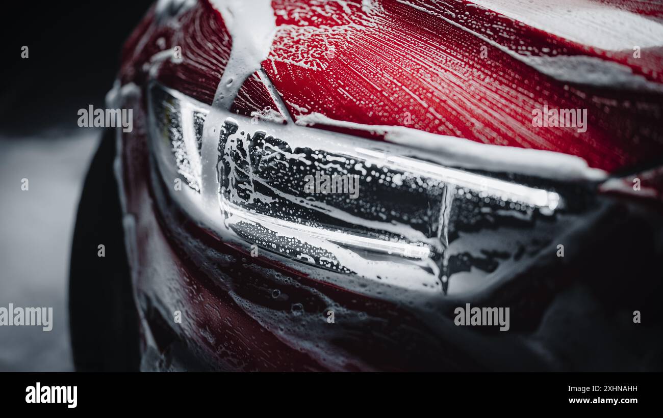 Red sportscar in car wash hi-res stock photography and images - Alamy