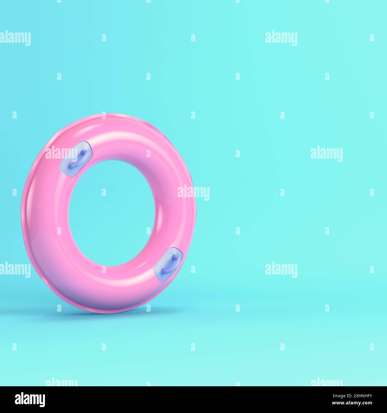 Pink inflatable lifebuoy ring on bright blue background in pastel ...