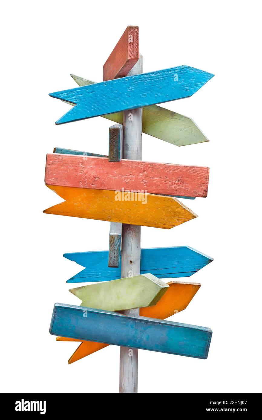 Colorful wooden direction arrow signs on a wooden pole isolated on a ...