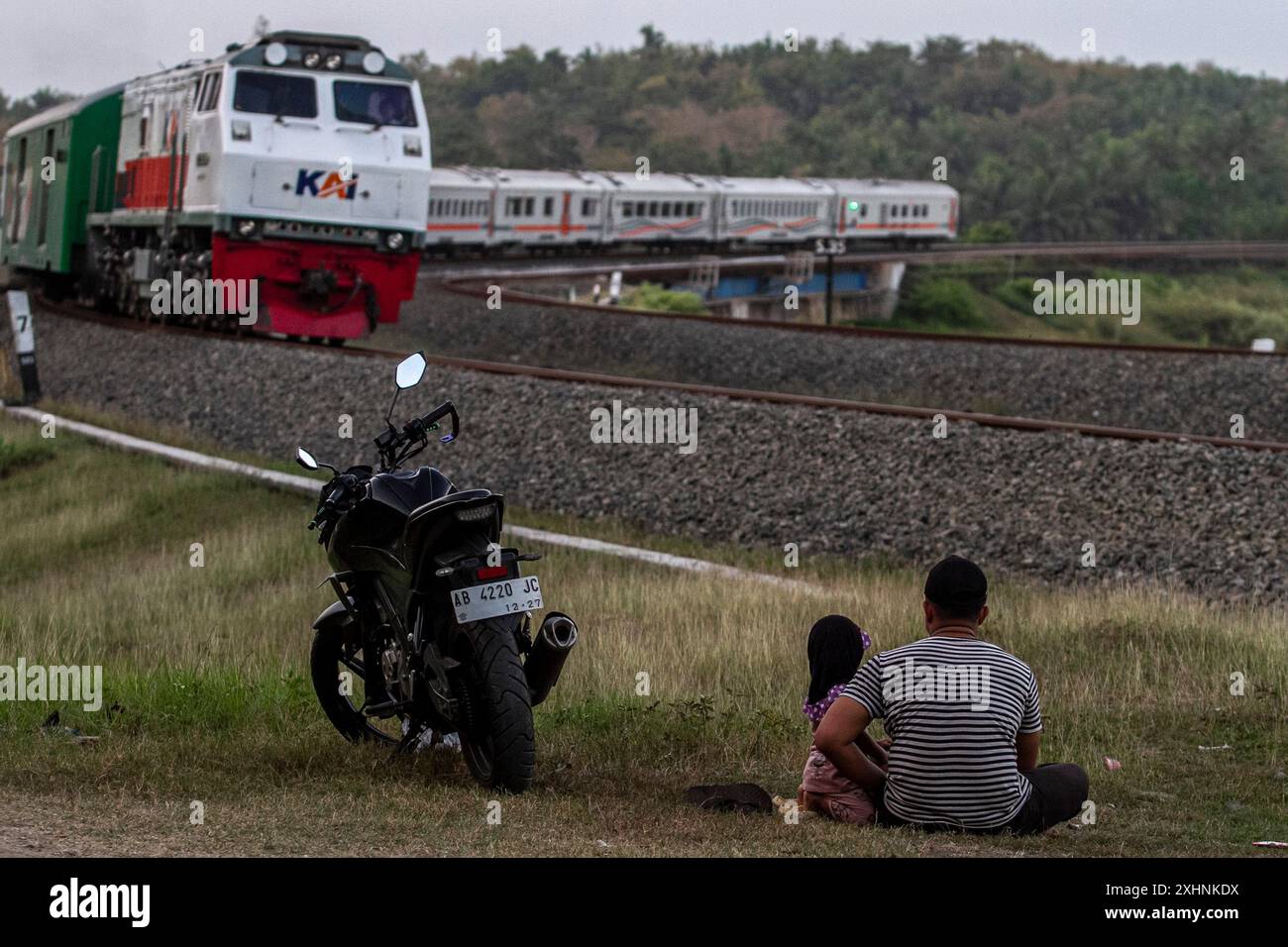 July 15, 2024, Kulon Progo, Yogyakarta, Indonesia: A father and his ...