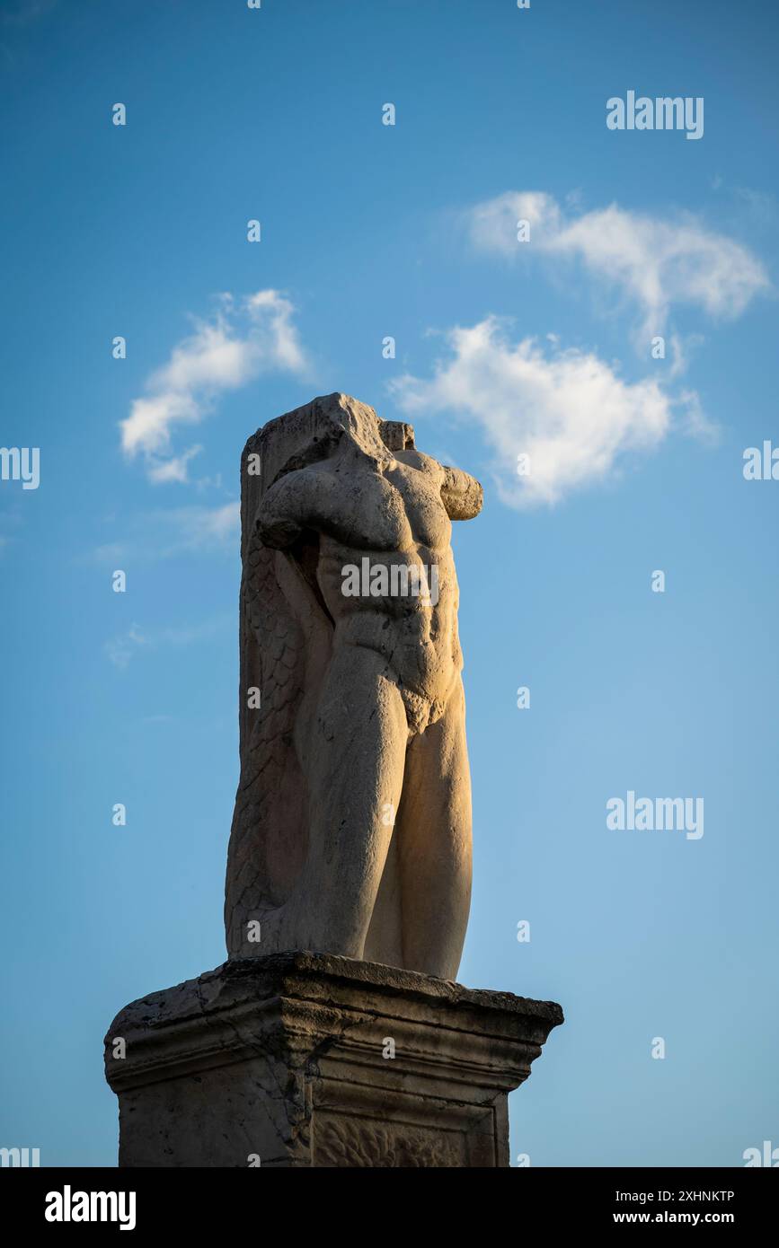 Statue of one of the Giants at the entrance to Odeon of Agrippa ...