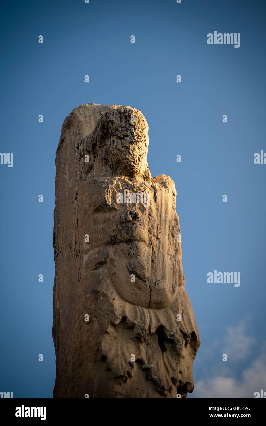 Statue of one of the Giants at the entrance to Odeon of Agrippa ...