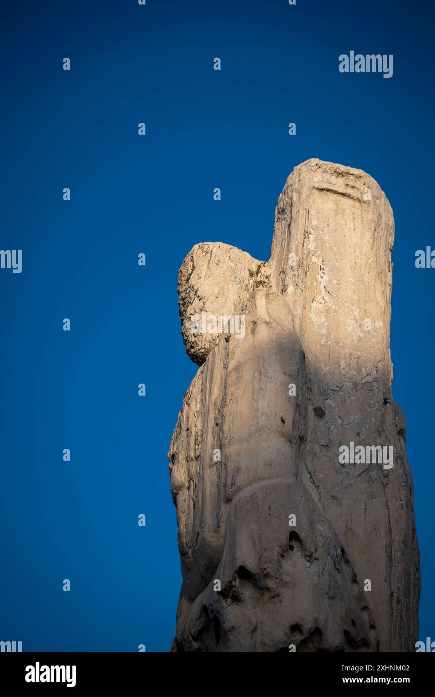 Statue of one of the Giants at the entrance to Odeon of Agrippa ...