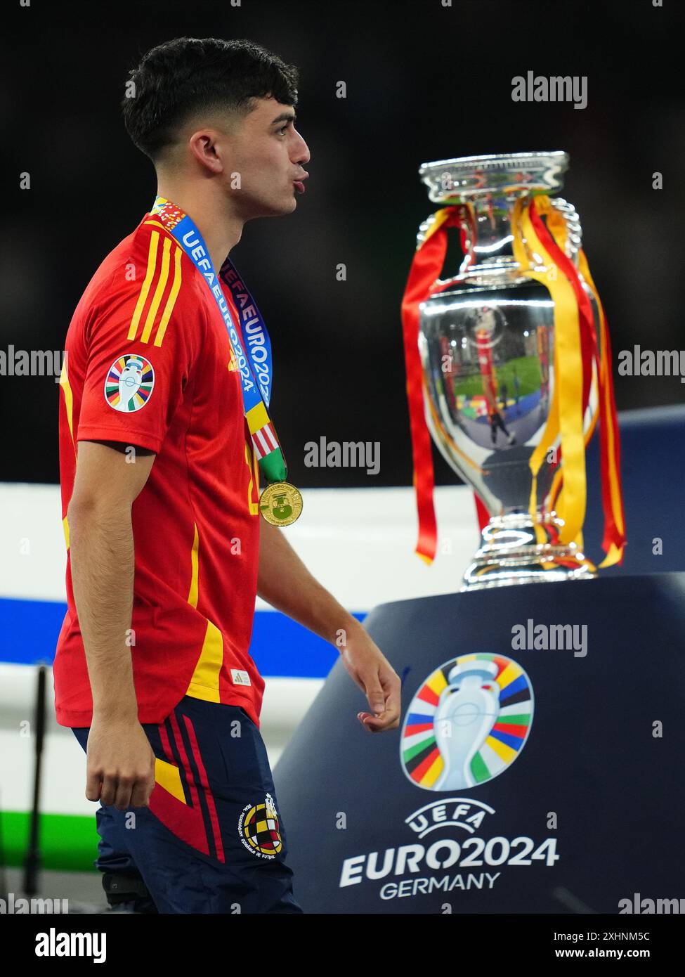 Berlin, Germany. 14th July, 2024. Pedri of Spain with the trophy during ...