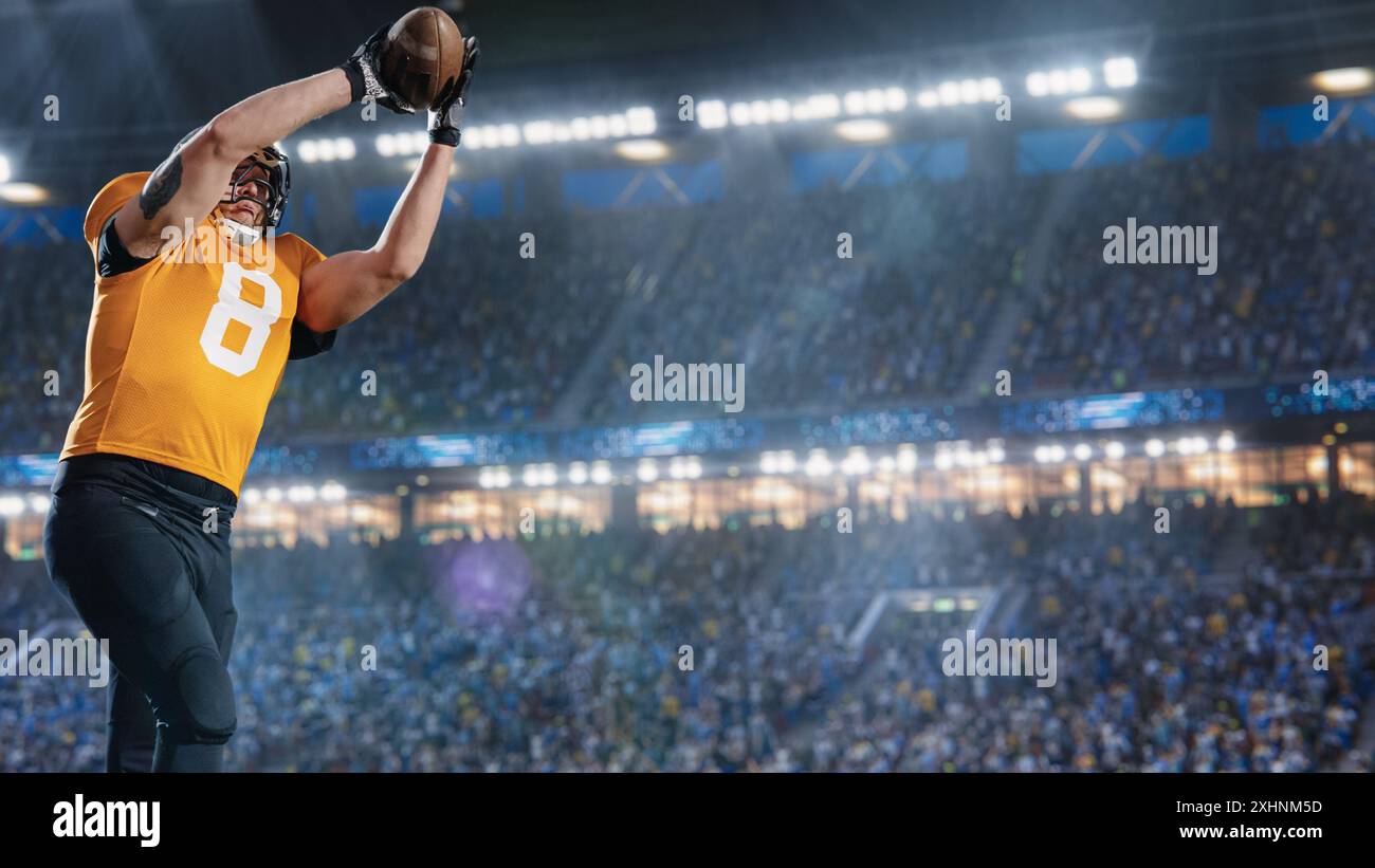 Aesthetic Shot of American Football Player Catching A Ball Mid Air on ...