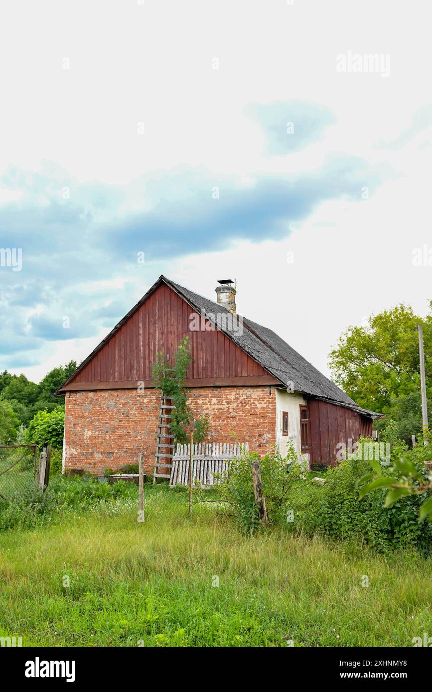 old rustic brick house against the background of the forest Stock Photo ...