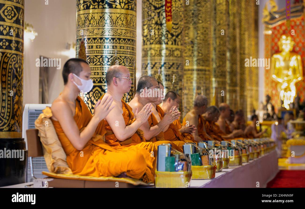 Chiang Mai, Thailand. 15th July, 2024. Thai monks chant prayers in the ...