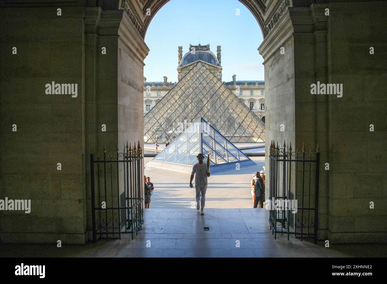 Paris, France. 14th July, 2024. EDITORIAL USE ONLY - Olympic Torch ...