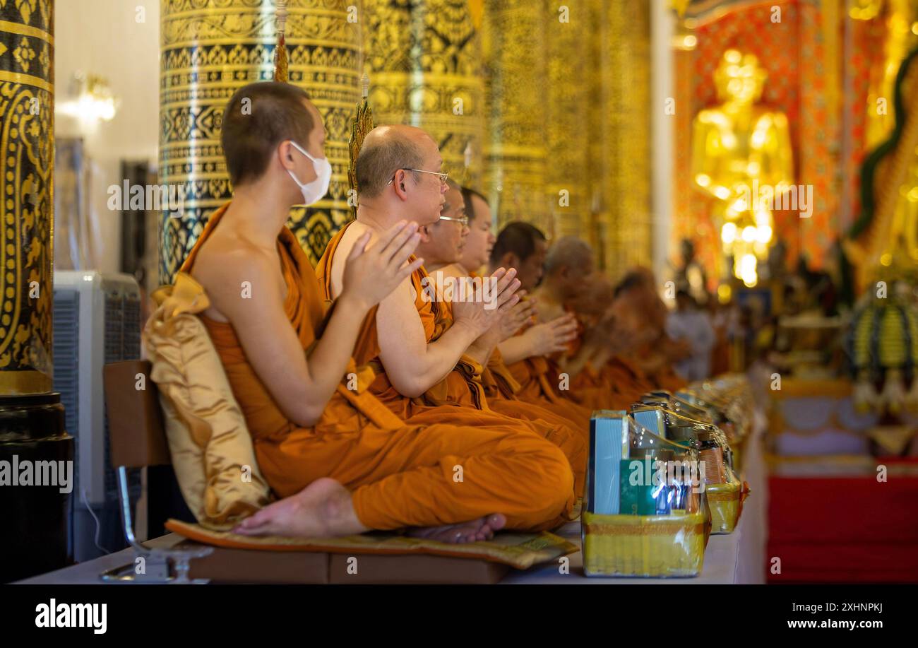 Chiang Mai, Thailand. 15th July, 2024. Thai monks chant prayers in the ...