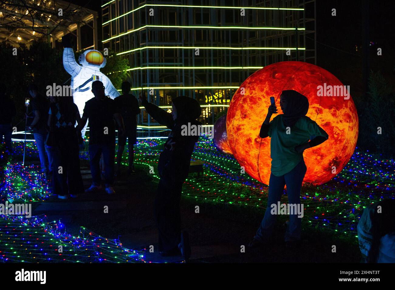 Bandung, West Java, Indonesia. 15th July, 2024. People take a photo at ...