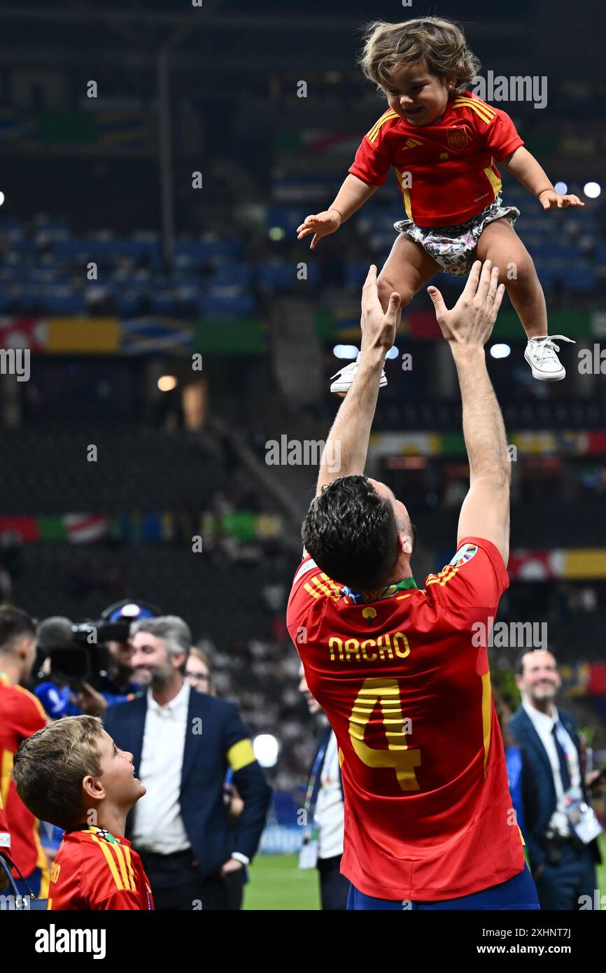 BERLIN, GERMANY - JULY 14: Nacho of Spain celebrate with his child ...