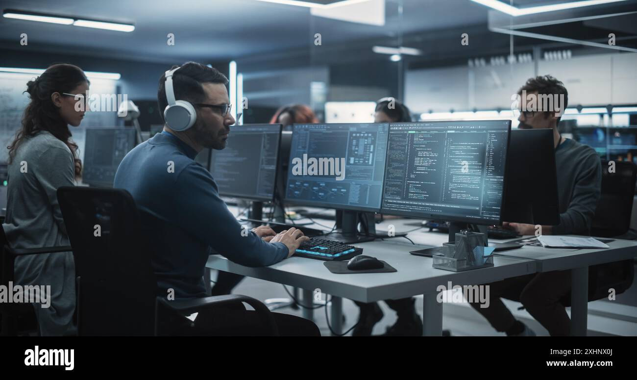 Team of Talented Young Professionals Working in a Technological ...