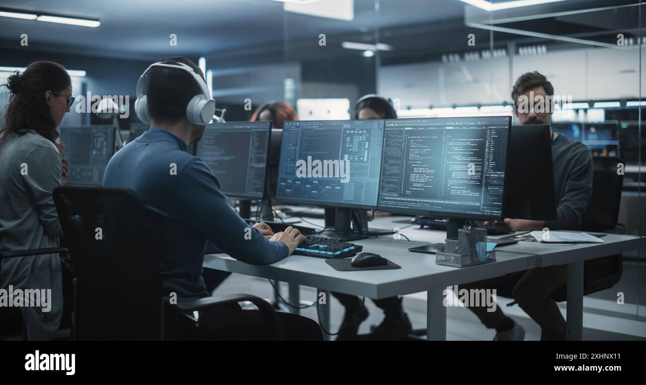 Team of Talented Young Professionals Working in a Technological Research and Development Agency ...