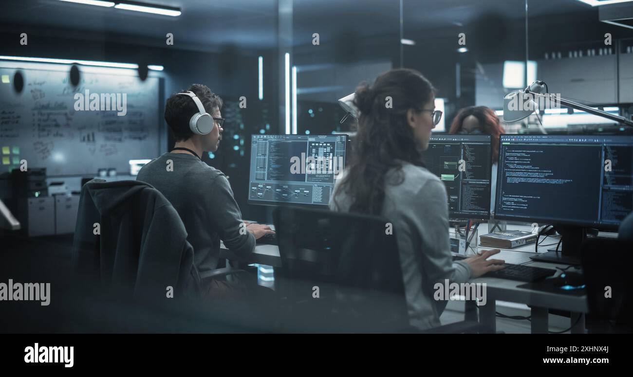 Team of Talented Young Professionals Working in a Technological ...