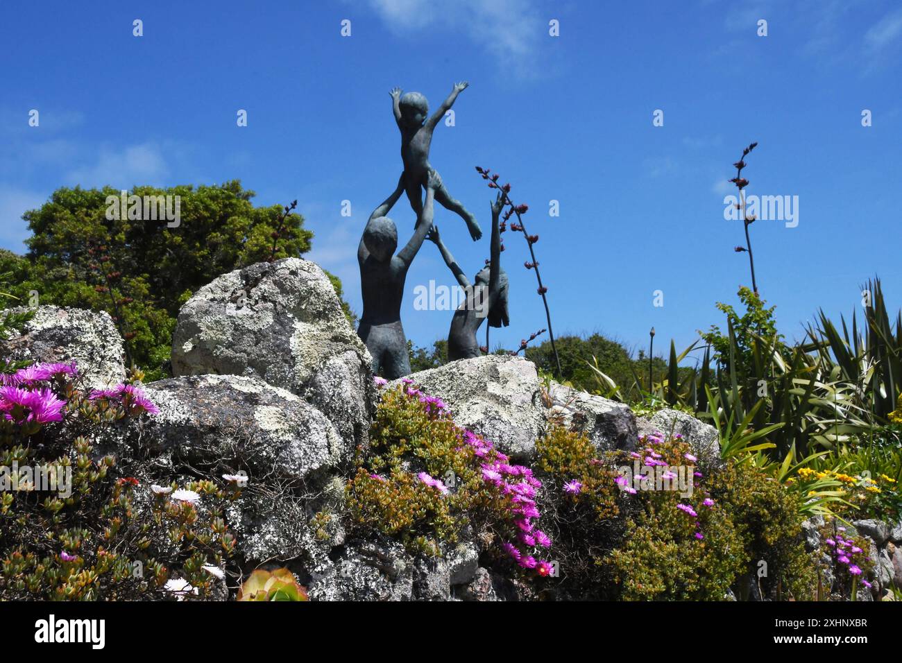 The statues of children playing by sculptor David Wynne viewed over the ...