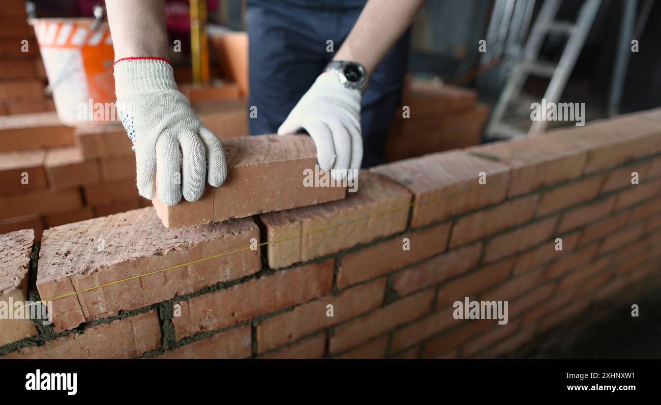Brickwork process hands construction worker hi-res stock photography ...