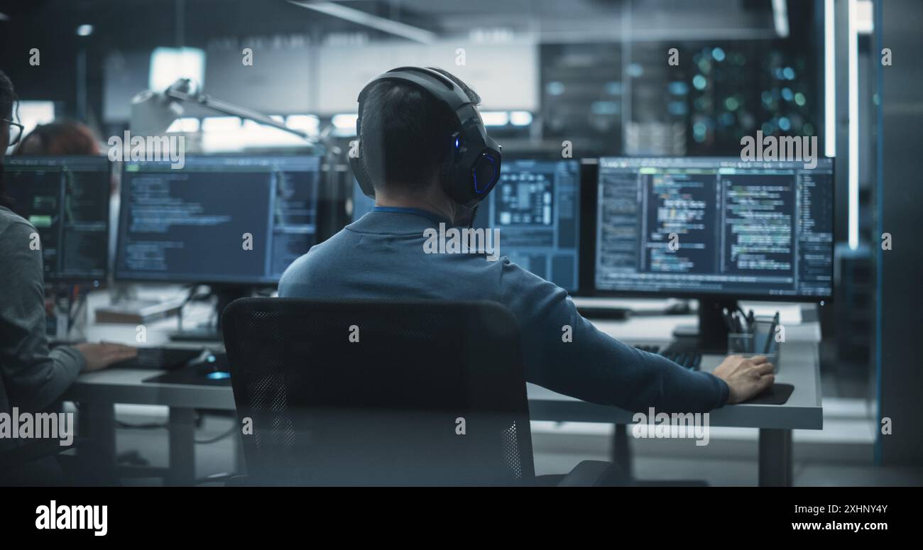 Group of Empowered Multicultural Men and Women Working in a Research ...