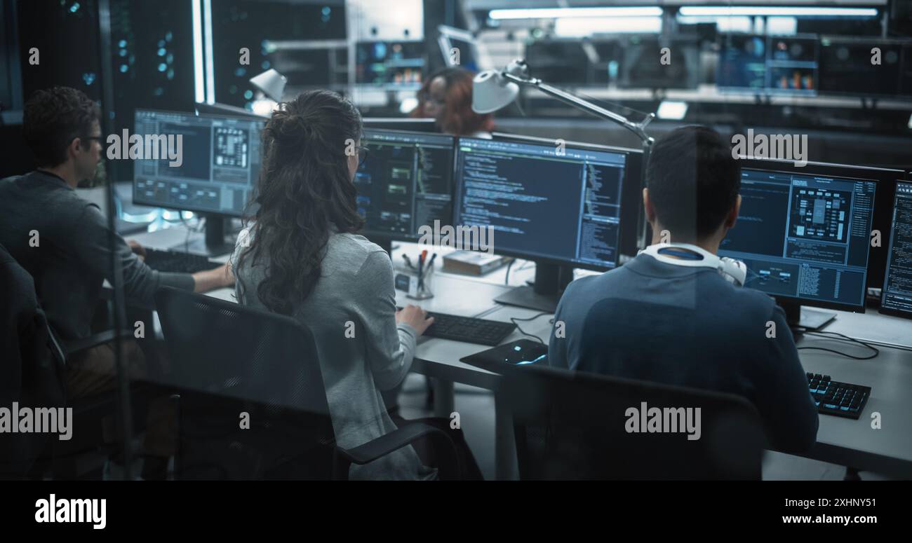 Team of Talented Young Professionals Working in a Technological ...