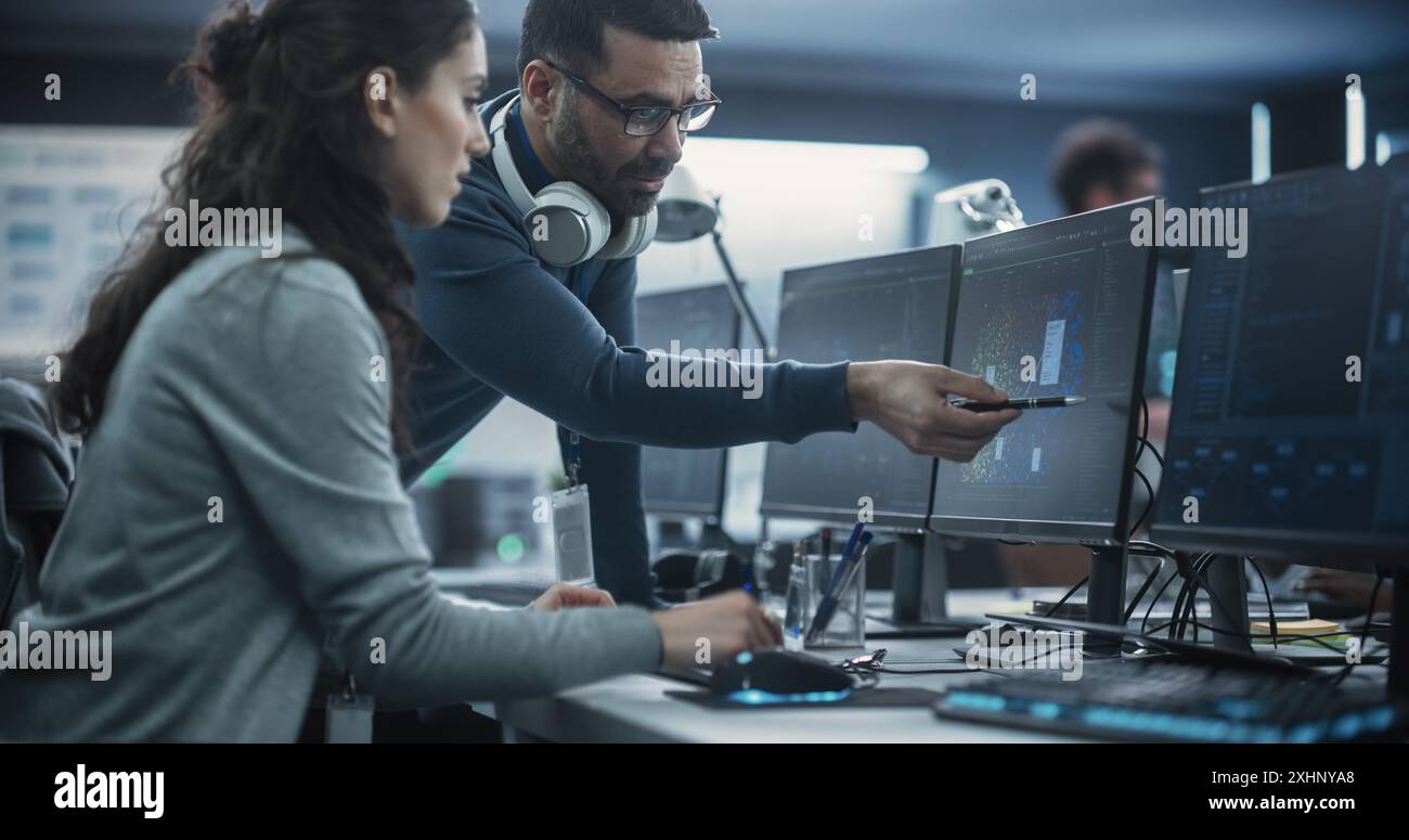Team Leader Having a Conversation with a Female Software Engineer. Team ...