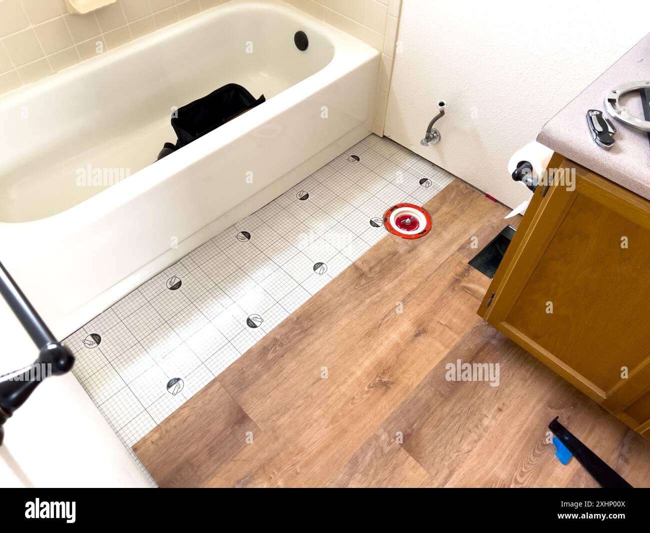 Bathroom Renovation in Progress with New Flooring Stock Photo - Alamy