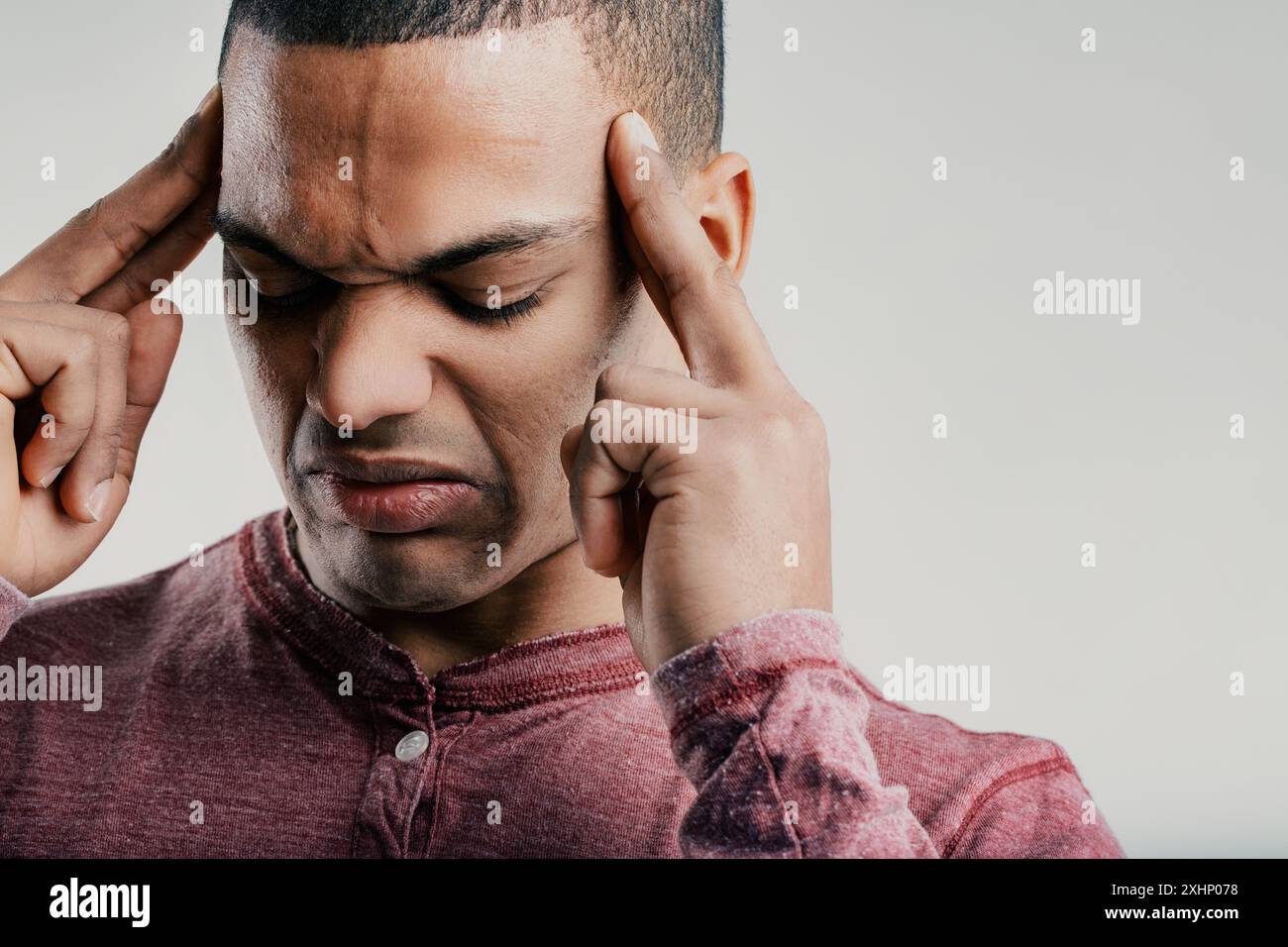 Young people wearing maroon hi-res stock photography and images - Alamy