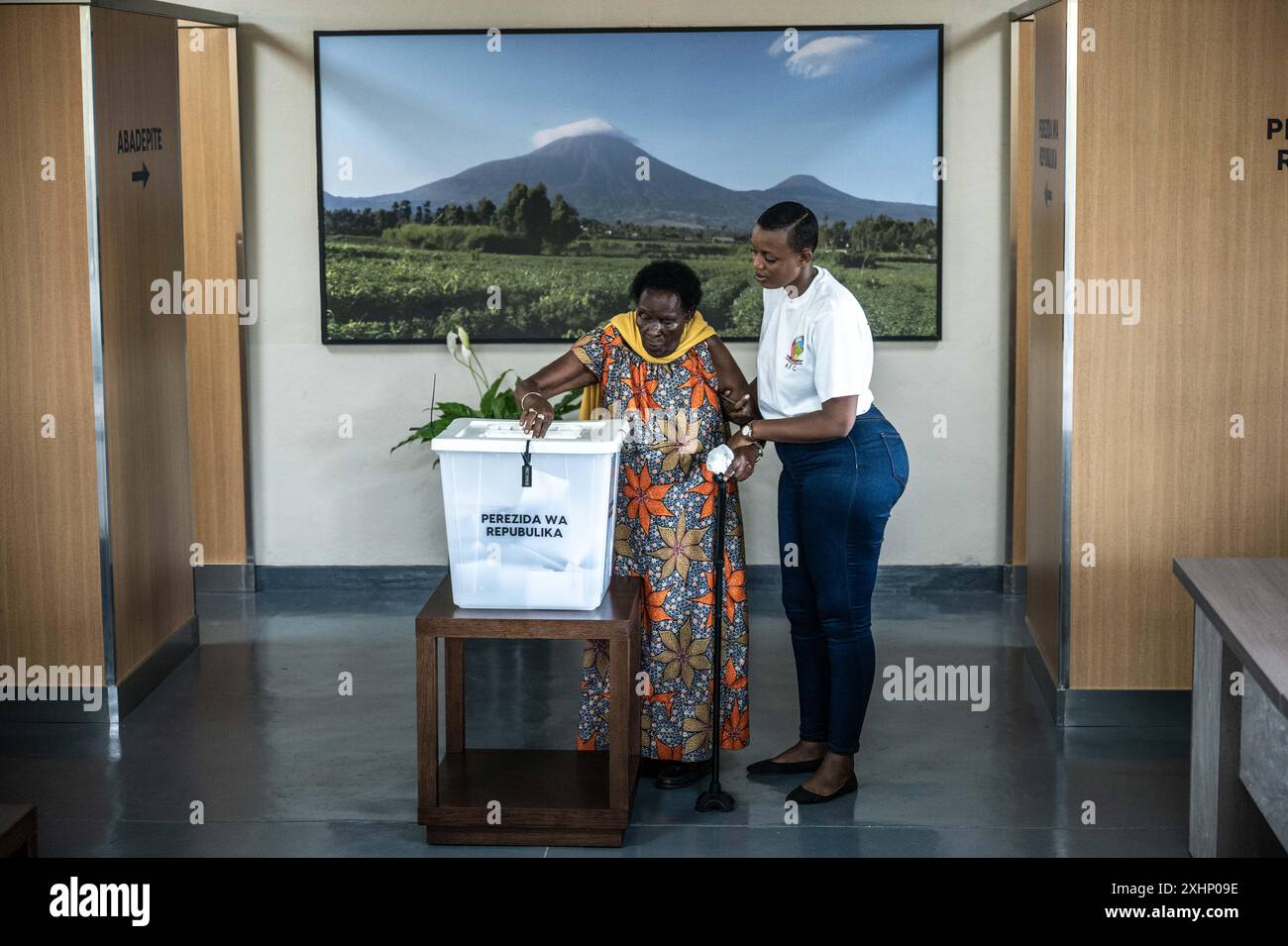 Kigali, Rwanda. 15th July, 2024. An elder voter casts her ballot with ...