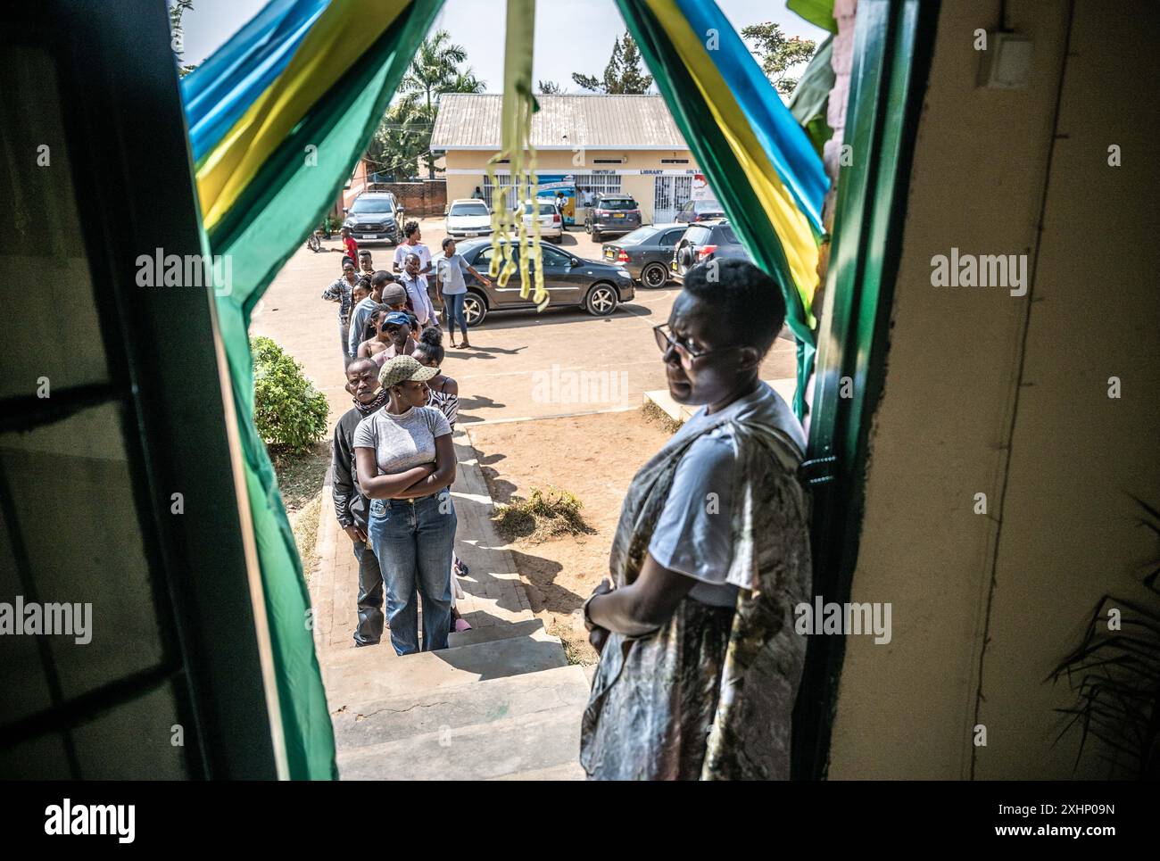 Kigali, Rwanda. 15th July, 2024. Voters wait for their turns to vote ...