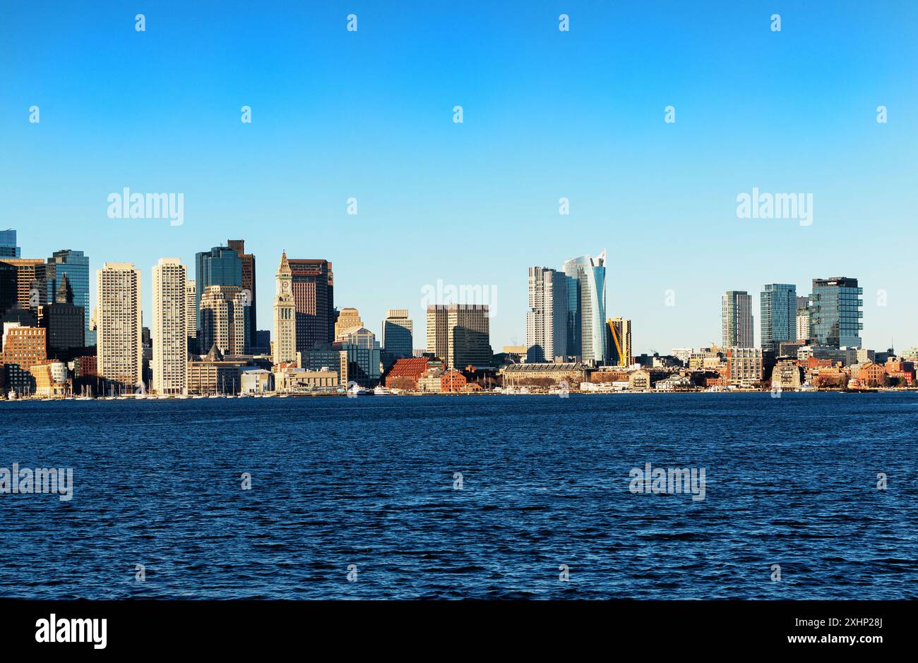 View across Boston Harbor of Boston's downtown waterfront skyline Stock ...