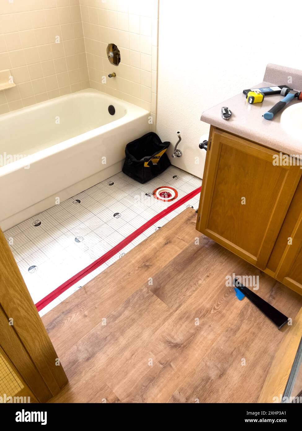 Bathroom Renovation in Progress with New Flooring Stock Photo - Alamy