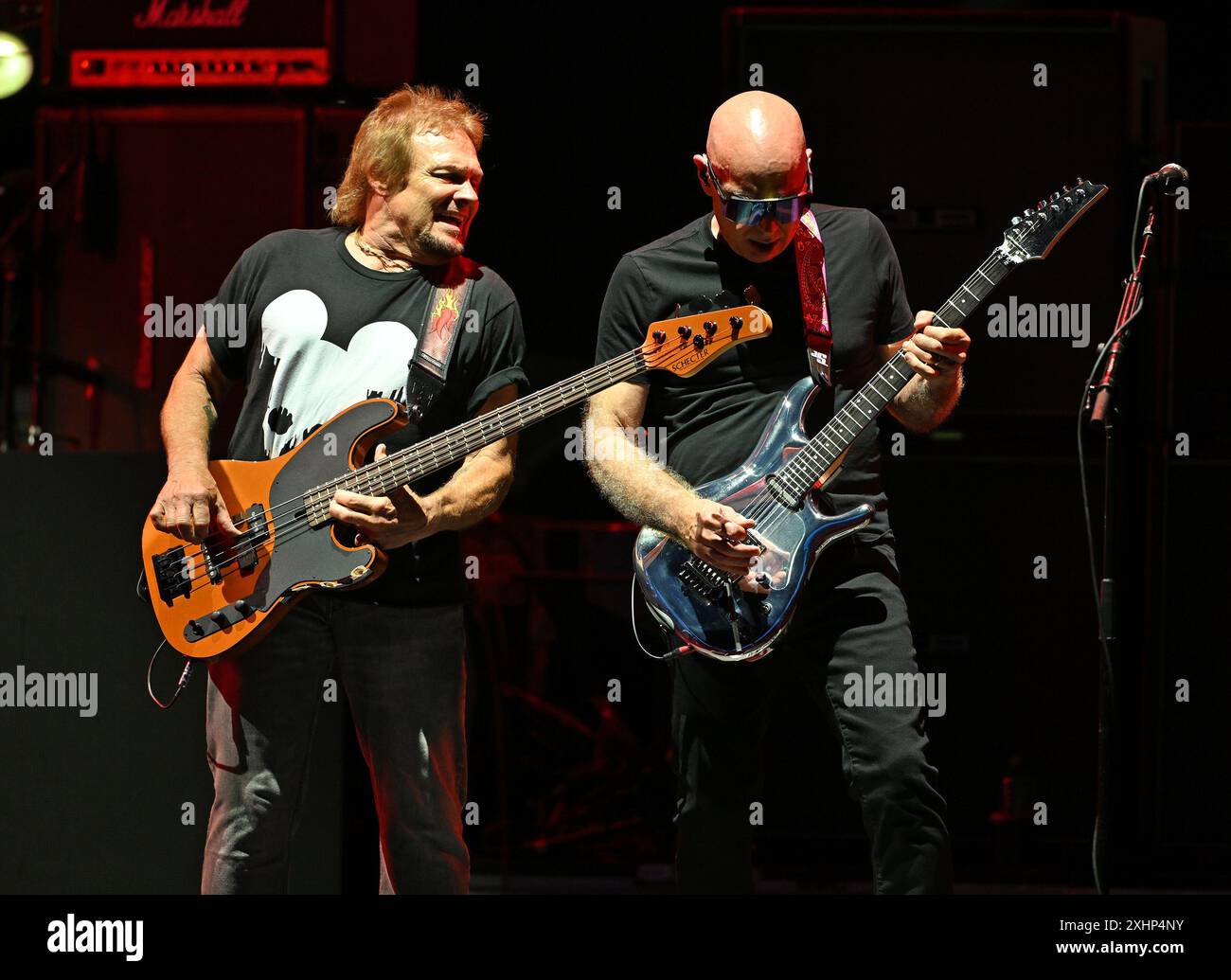 WEST PALM BEACH, FL - JULY 13: Michael Anthony and Joe Satriani perform ...