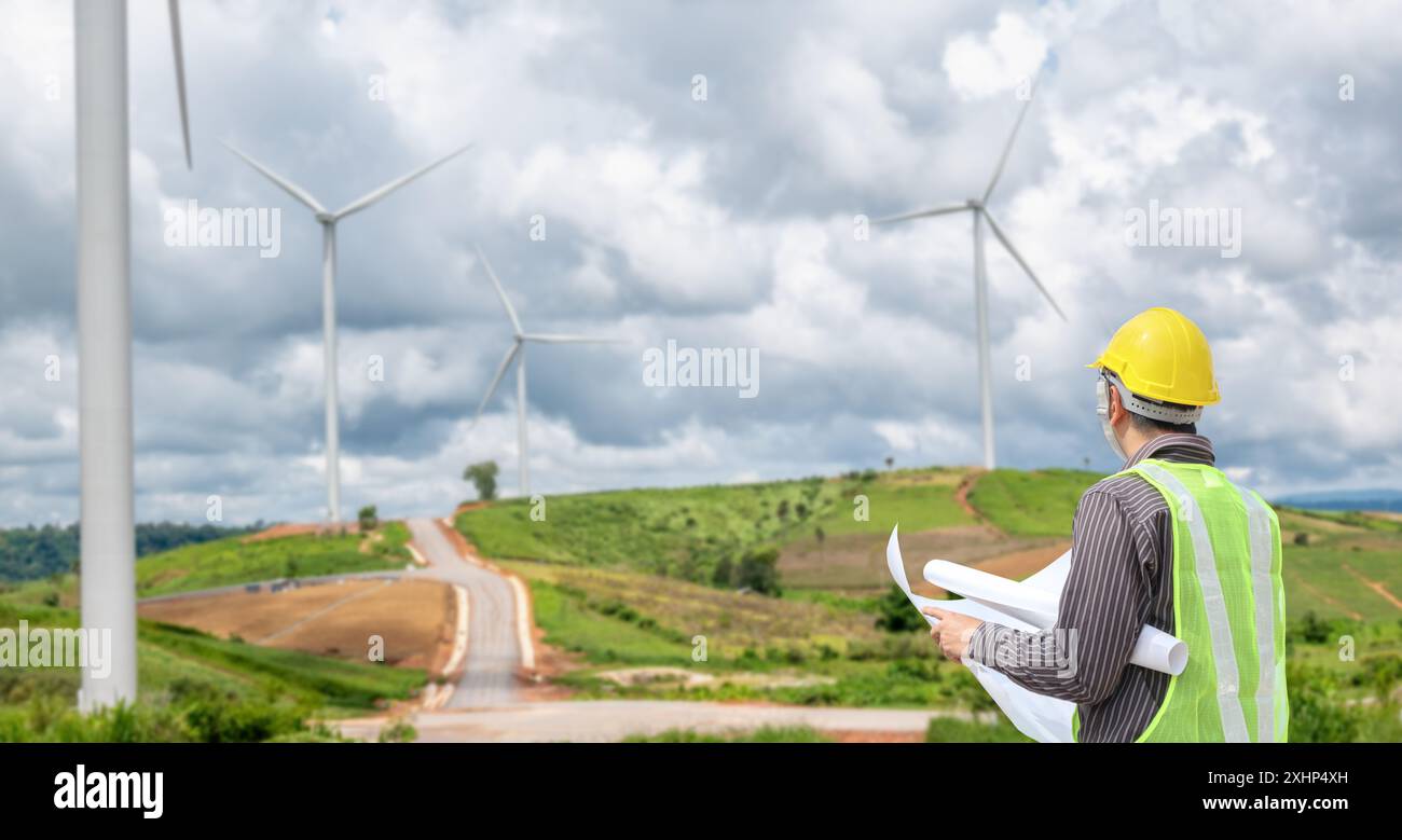 Engineer worker at wind turbine power station construction site Stock ...