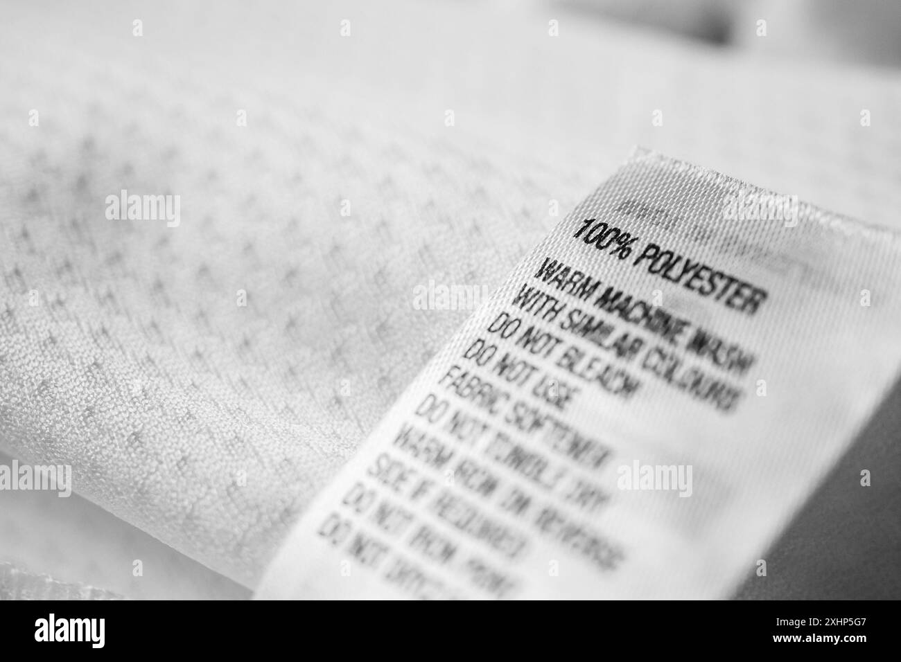 Polyester fabric Clothing label with laundry instructions Stock Photo ...