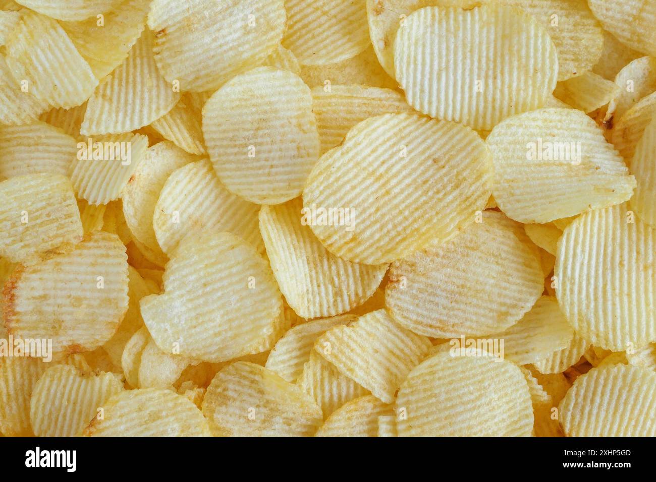 crispy potato chips snack texture background Stock Photo - Alamy