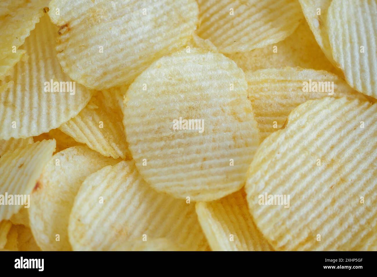 crispy potato chips snack texture background Stock Photo - Alamy