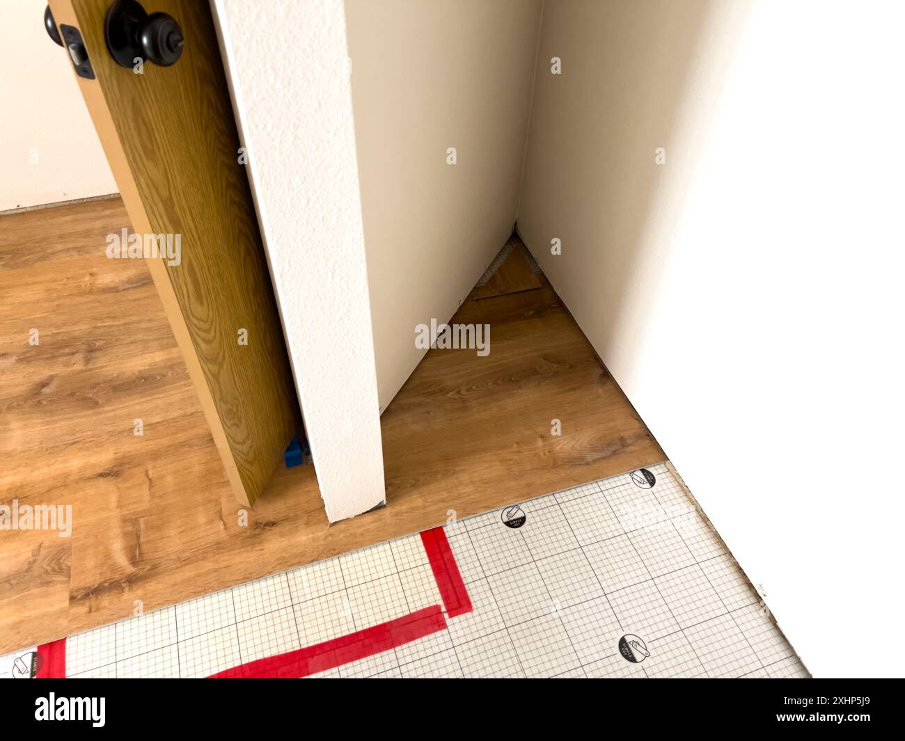 Flooring Installation with Laminate and Underlayment in Progress Stock ...