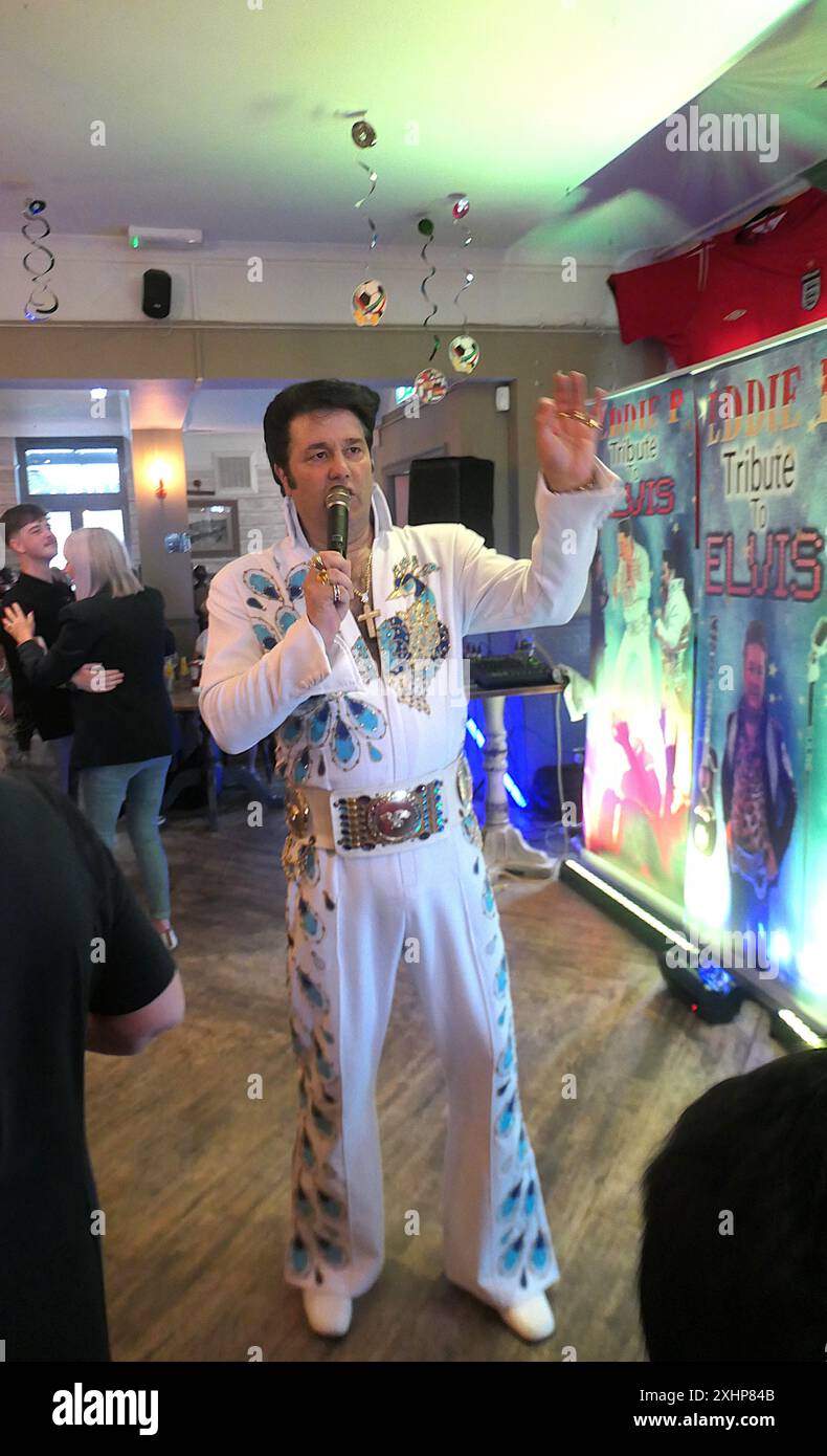Elvis Presley lookalike person sing singing songs America American ...
