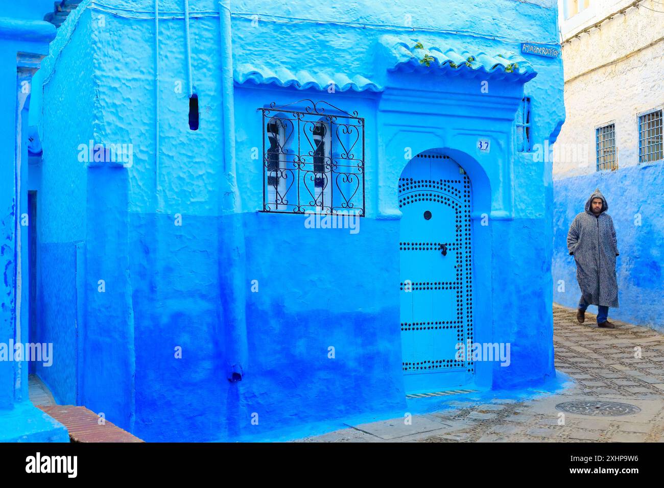 Morocco, Rif region, Chefchaouen, medina, man in djellaba Stock Photo ...
