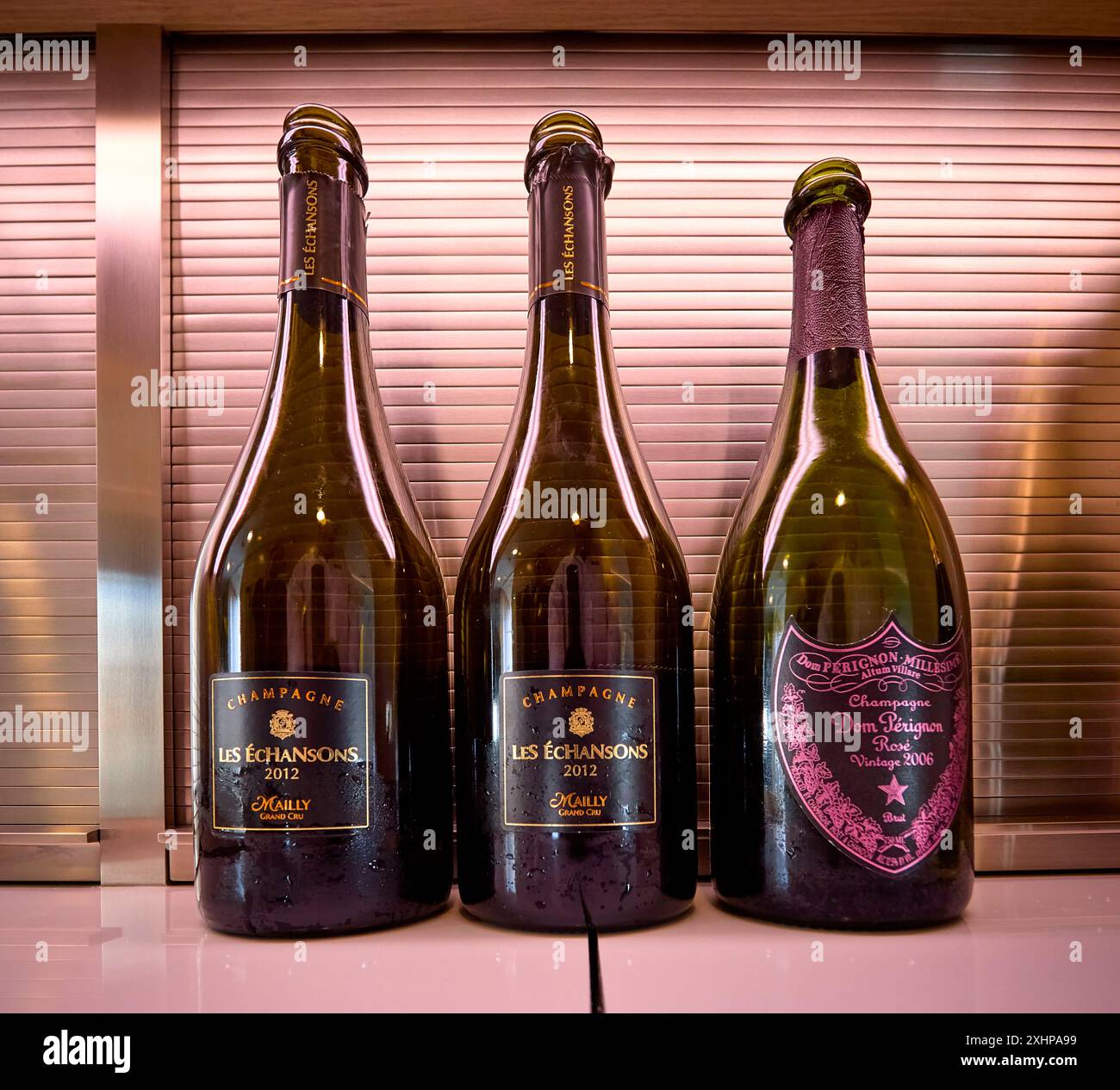 Expensive French champagne about to the served aboard a private jet ...