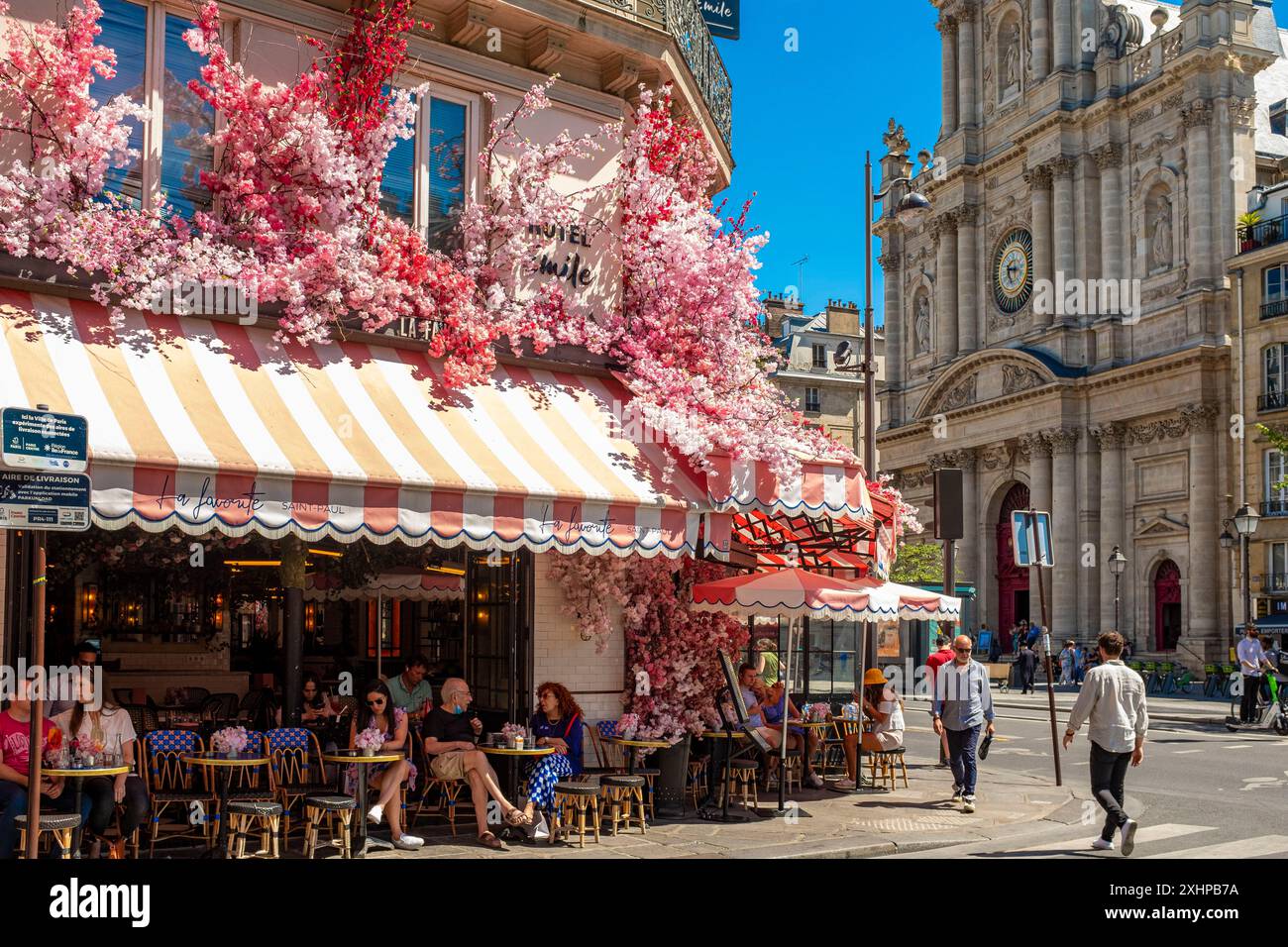 France, Paris, Marais district, terrace and flowered facade of café La ...