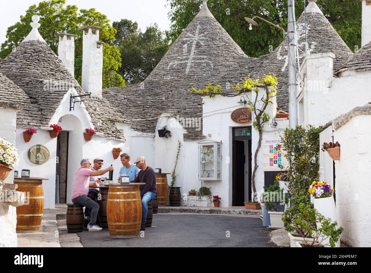 Italy, Apulia, Alberobello, the trulli listed as World Heritage by ...