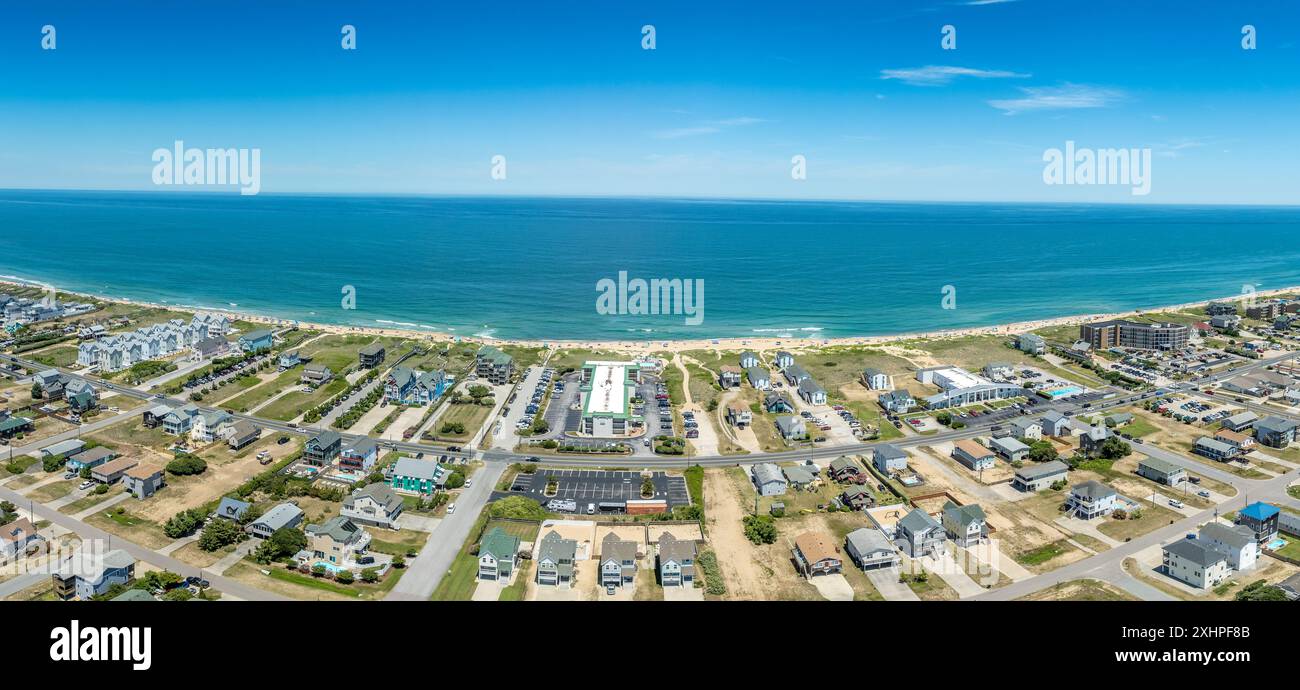 Aerial view of Kitty Hawk Beach with multiple vacation rental ...