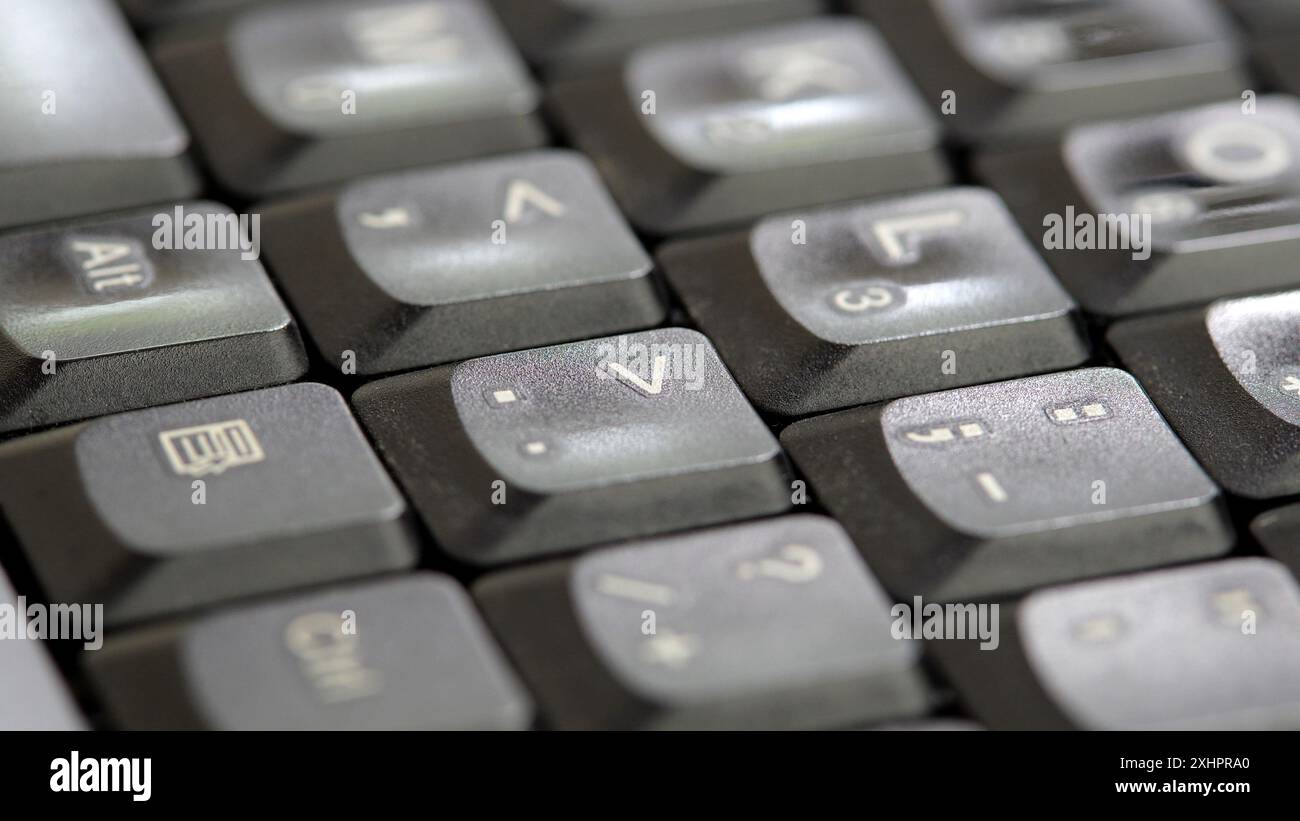Simple generic laptop computer keyboard keys seen from up close at an ...