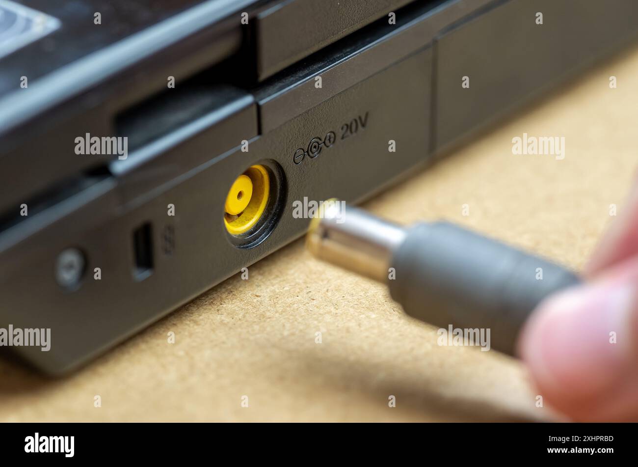 Man unplugging charger plug laptop hi-res stock photography and images ...