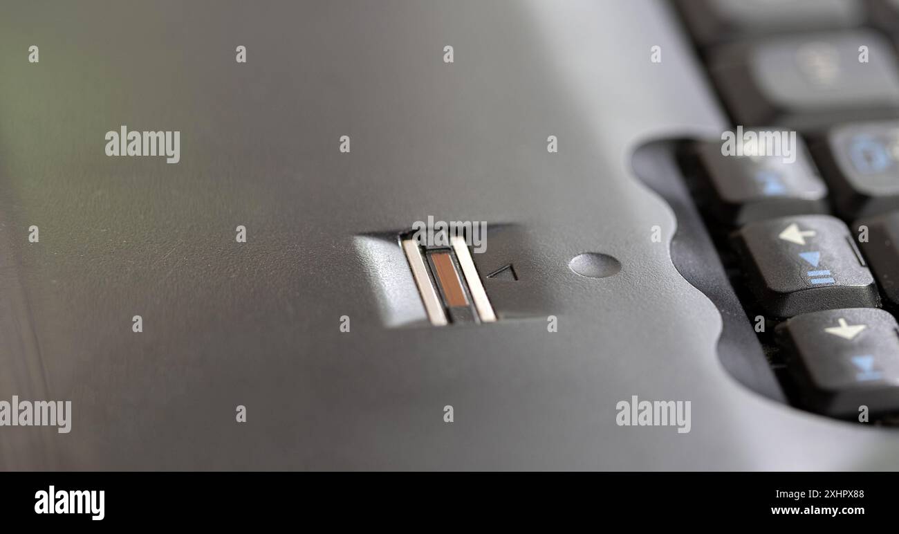 Generic laptop fingerprint scanner sensor module object detail closeup ...