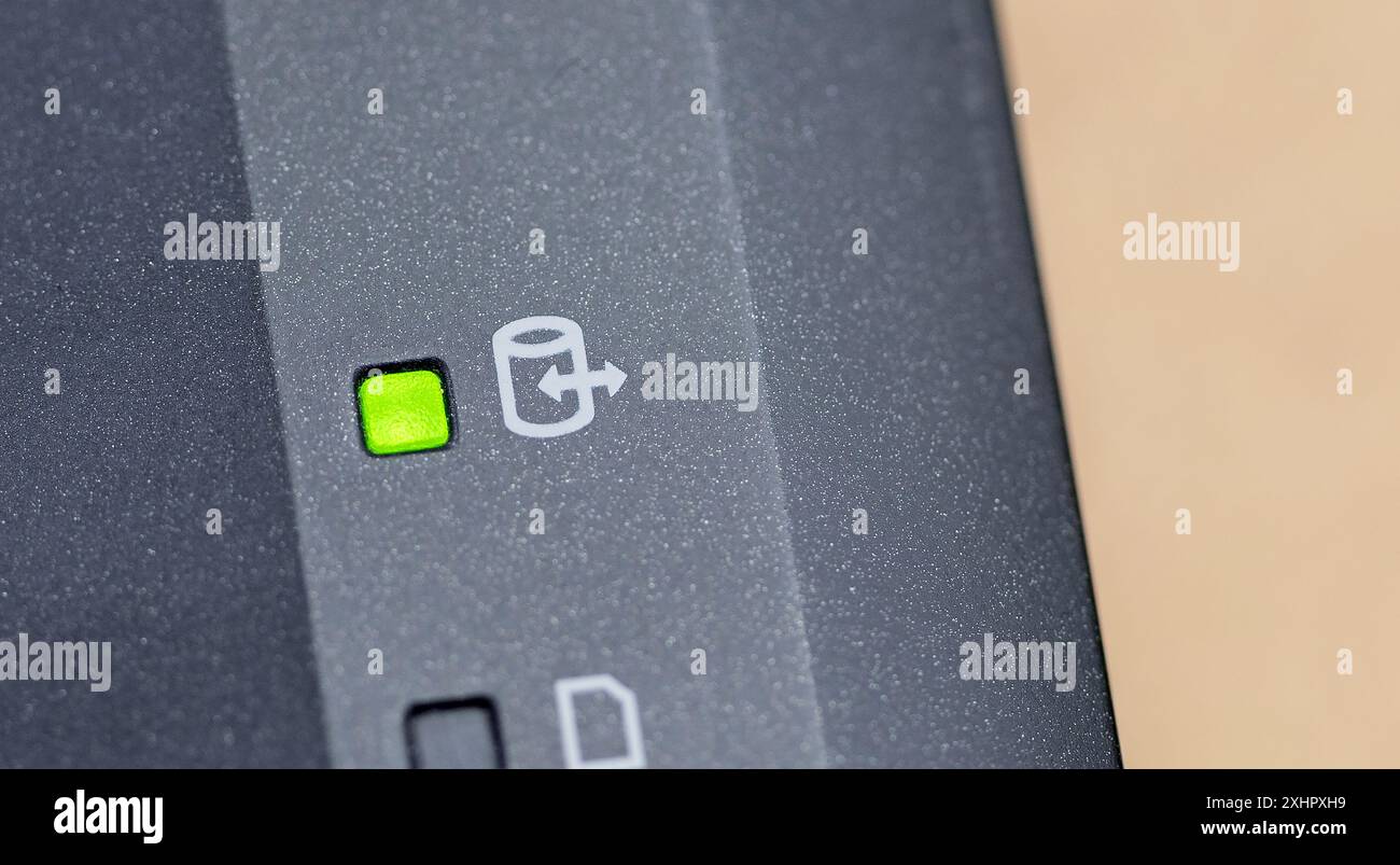 Hard drive activity light indicator blinking on a laptop computer ...