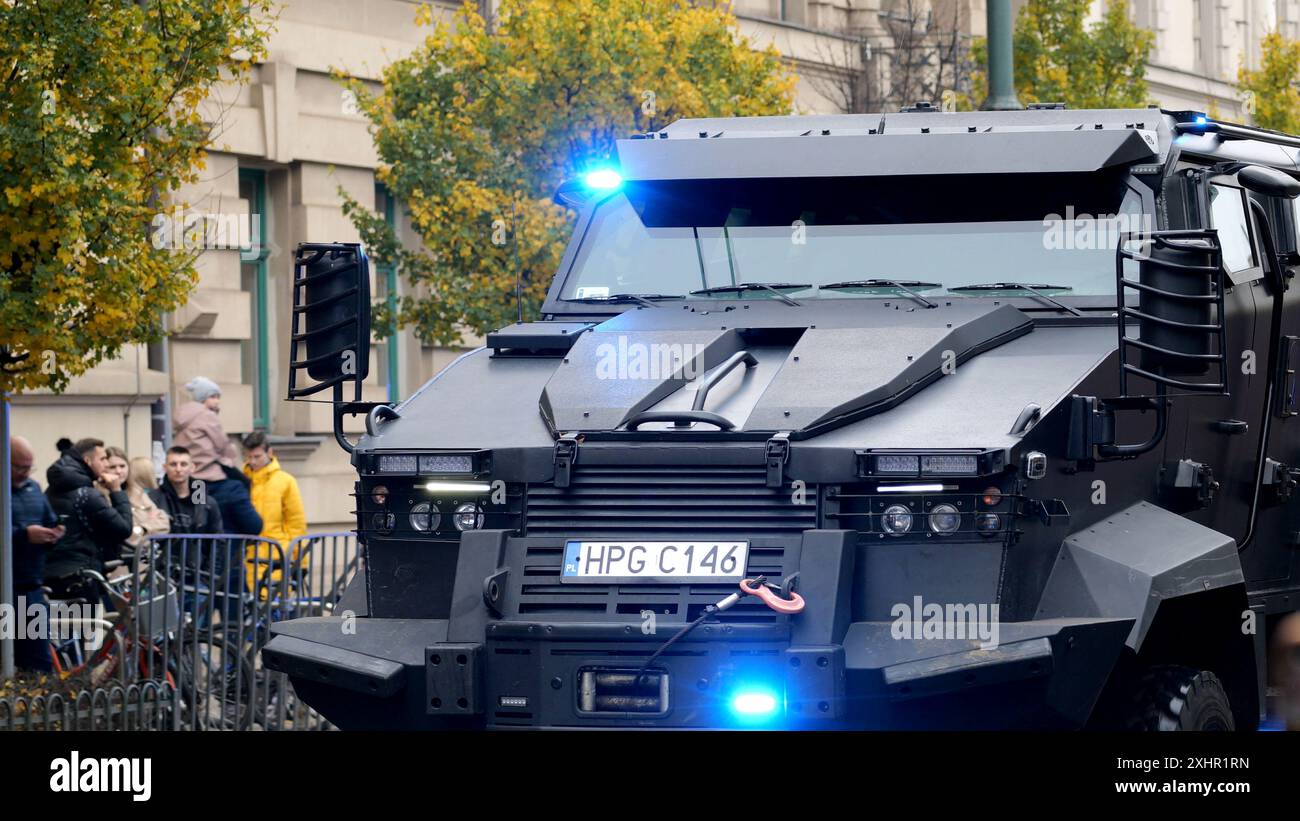 Professional modern armored police vehicle with emergency blue flashing ...