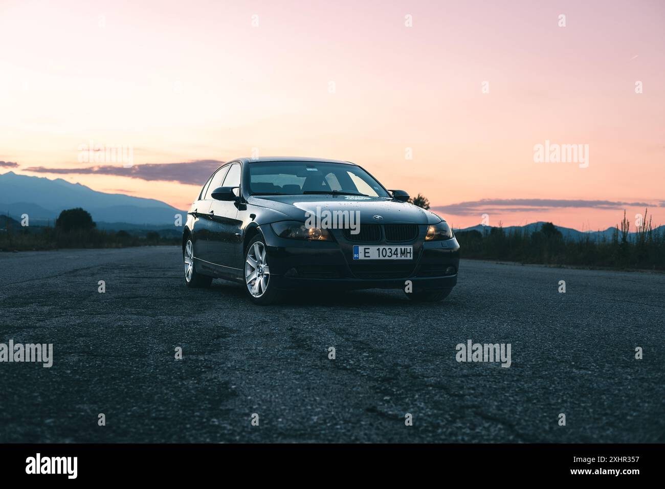 Bulgaria - 07 23 2024: Epic BMW E90 photo with beautiful orange sky in ...