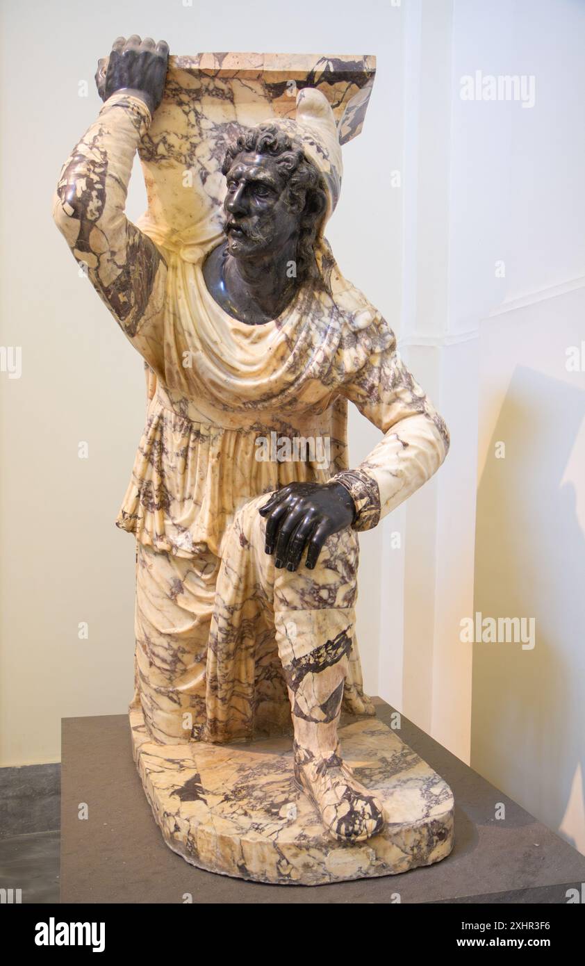 Kneeling barbarian statue in Pavonazzetto marble. Also know as "Farnese ...